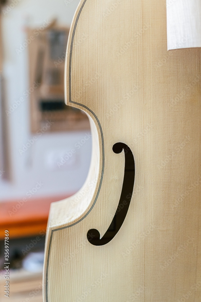 Cello in one of the stages of its construction in the Luthier's ...
