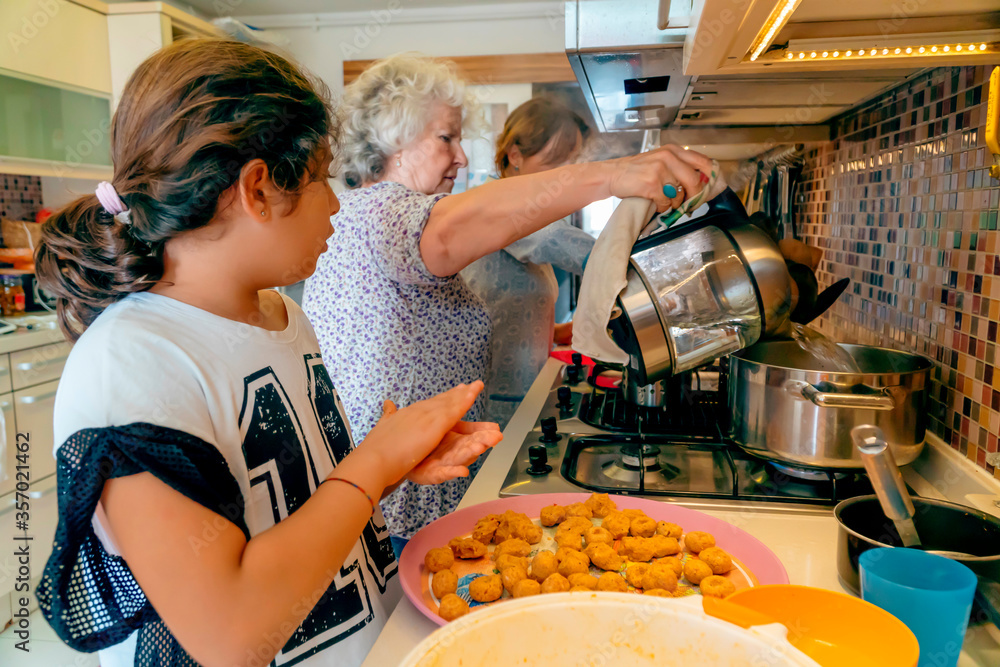 Three generation cooking: Turkish grandmother is teaching her ...