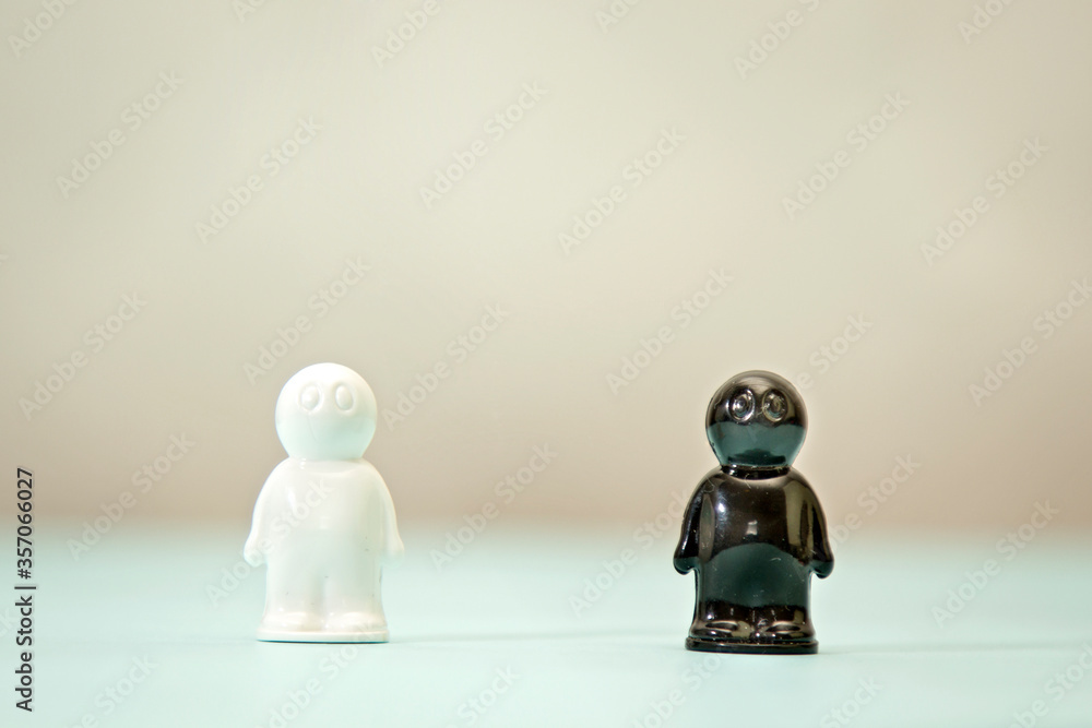 a pair of people with different skin colors, different nationalities ...