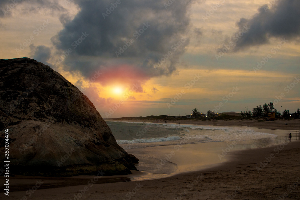 Brazilian beach, corner of the beach with big rock, sand and sea ...