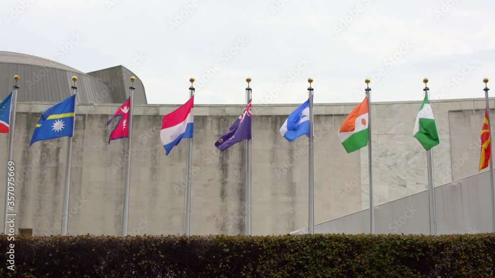Flags at the United Nations Headquarter in New York City. Slow Motion ...
