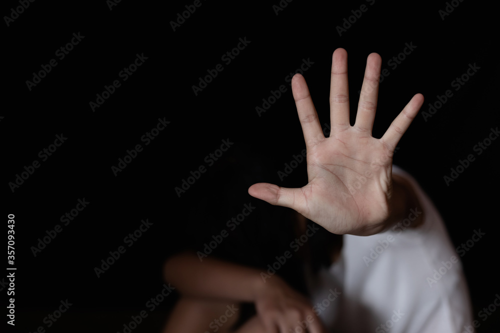 Young girl with her hand sign for stop abusing against campaign ...