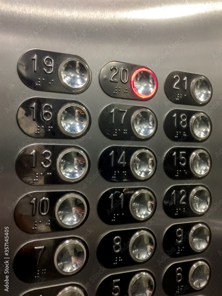 Round buttons control panel inside Elevator in office residential ...