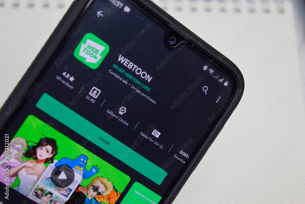 WEBTOON dev app with magnifying on Smartphone screen. WEBTOON is a ...