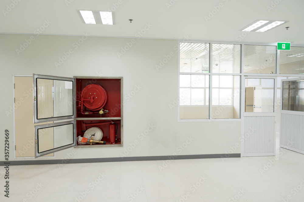 Rescue firefighter equipment, fire line in red box.Fire hose reel in ...