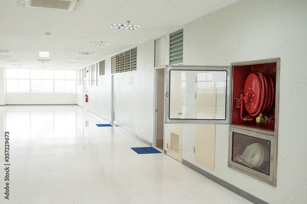 Rescue firefighter equipment, fire line in red box.Fire hose reel in ...