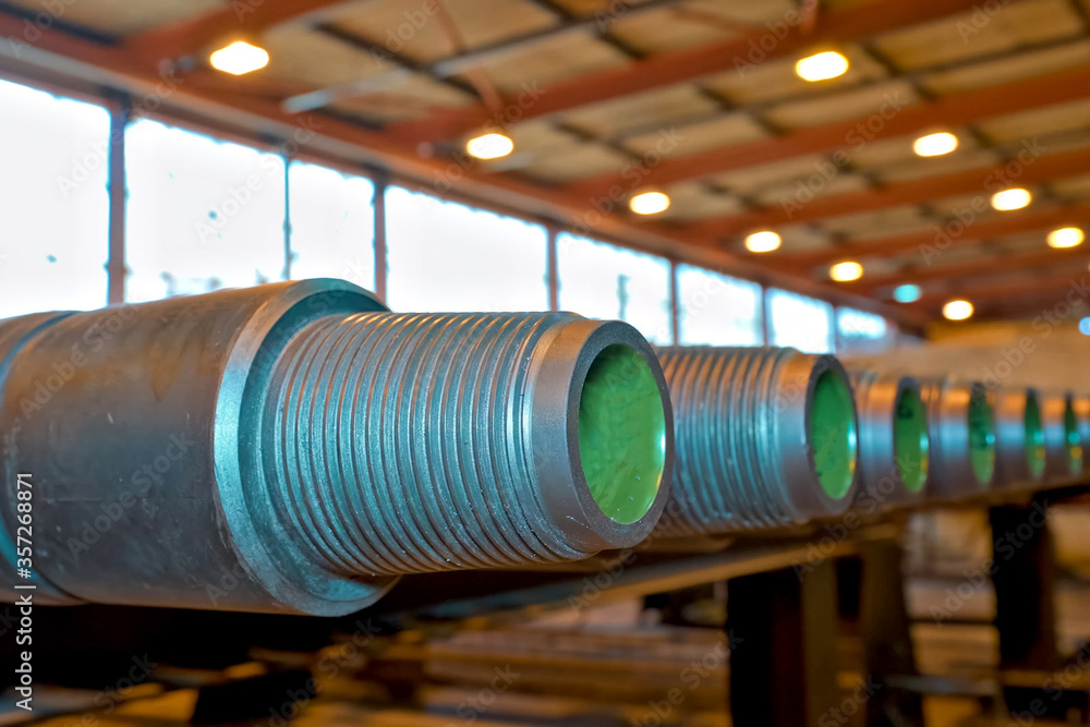 Pumped compressor pipes for oil well. Oil and gas equipment. Stock ...