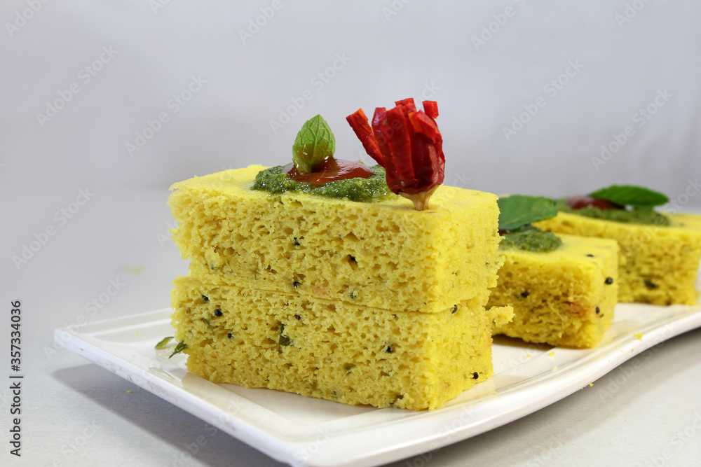 Khaman Dhokla is very popular Steam cooked Gujarati snacks made from ...