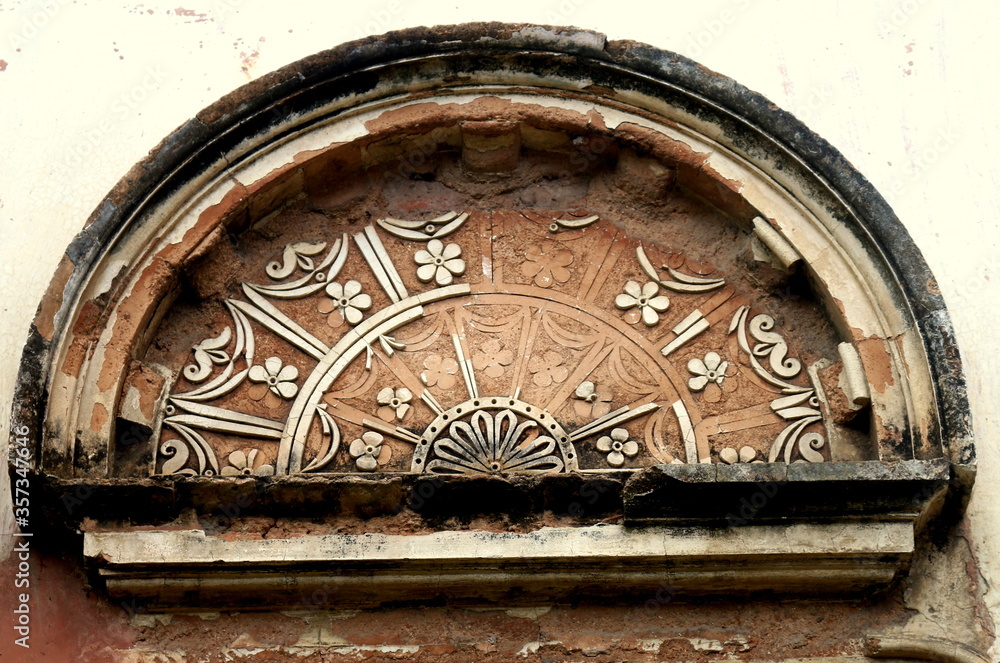 Old vintage earthenware wall ruined house in Panam Nagor. An ancient ...