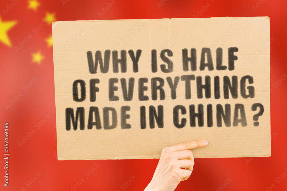 The phrase " Why is half of everything made in China? " on a banner in ...