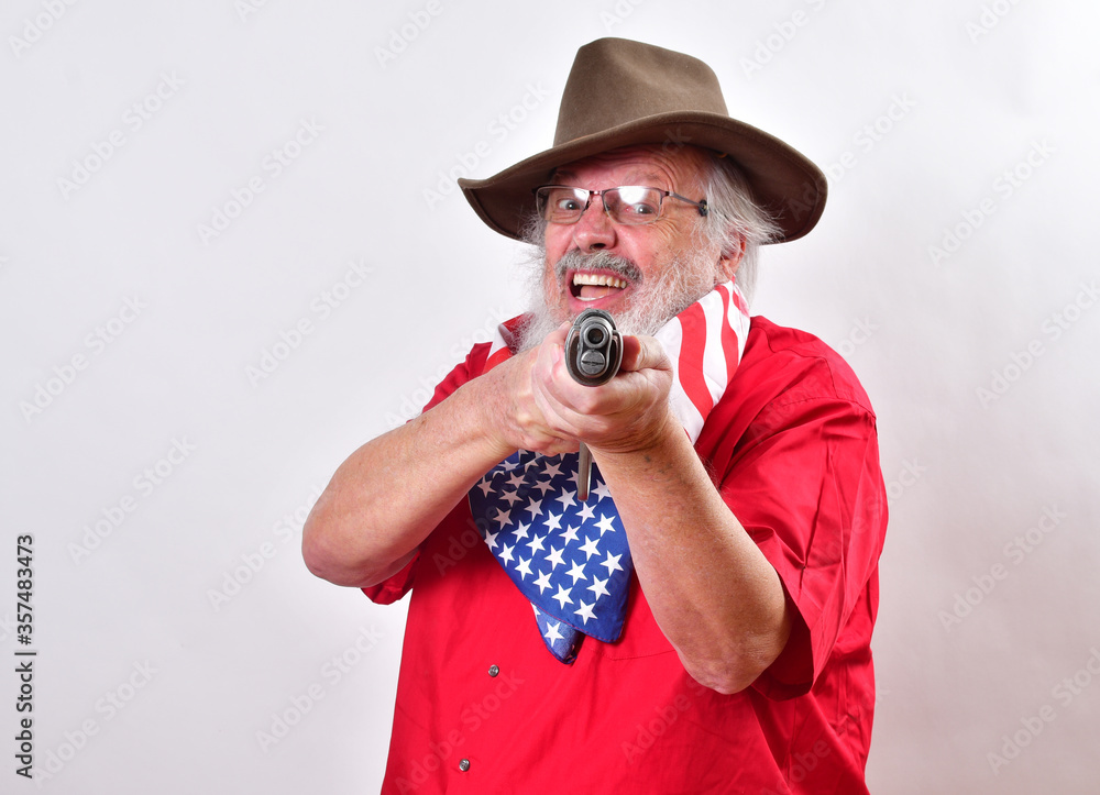 Angry old man, armed with a sawed off rifle, wearing patriotic colors ...