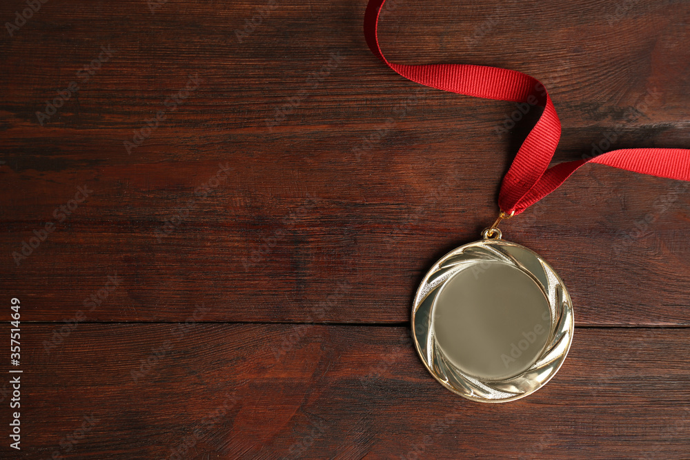 Gold medal on wooden background, top view. Space for design Stock Photo ...