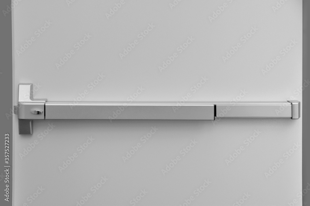 Emergency exit door. Push bar and rail for panic exit Stock Photo ...