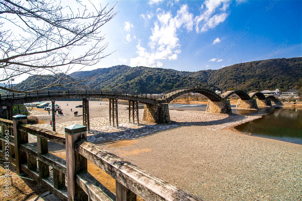 Kintaikyo Bridge at Iwakuni, Yamaguchi, Japan. It is a wooden bridge ...