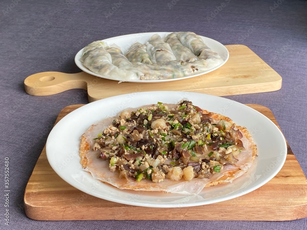 Vietnamese rice cracker with mince pork and steamed rice flour on top ...