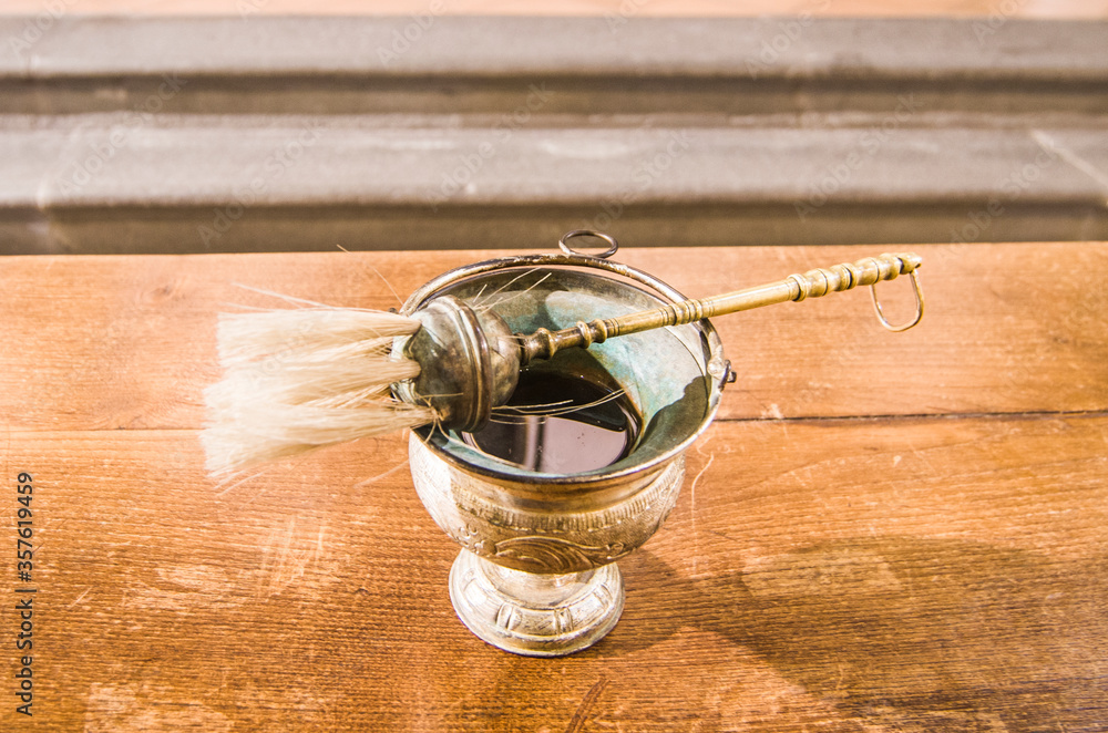 blessed water ready to welcome the faithful, believers and the whole ...