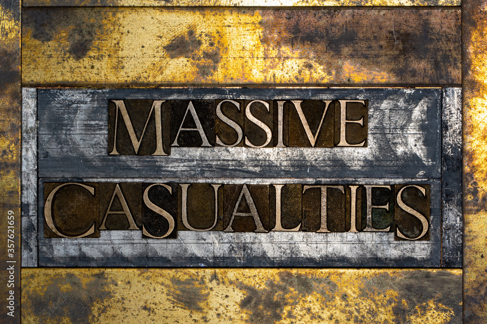 Massive Casualties text formed with real authentic typeset letters on ...