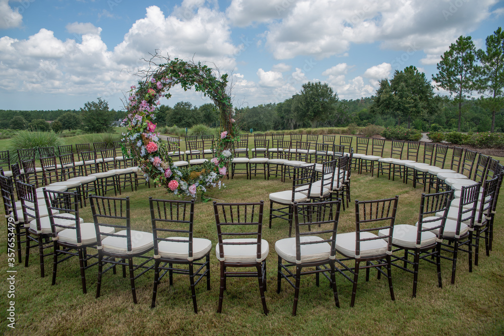 Unique round spiral chair pattern wedding ceremony setting at rolling ...