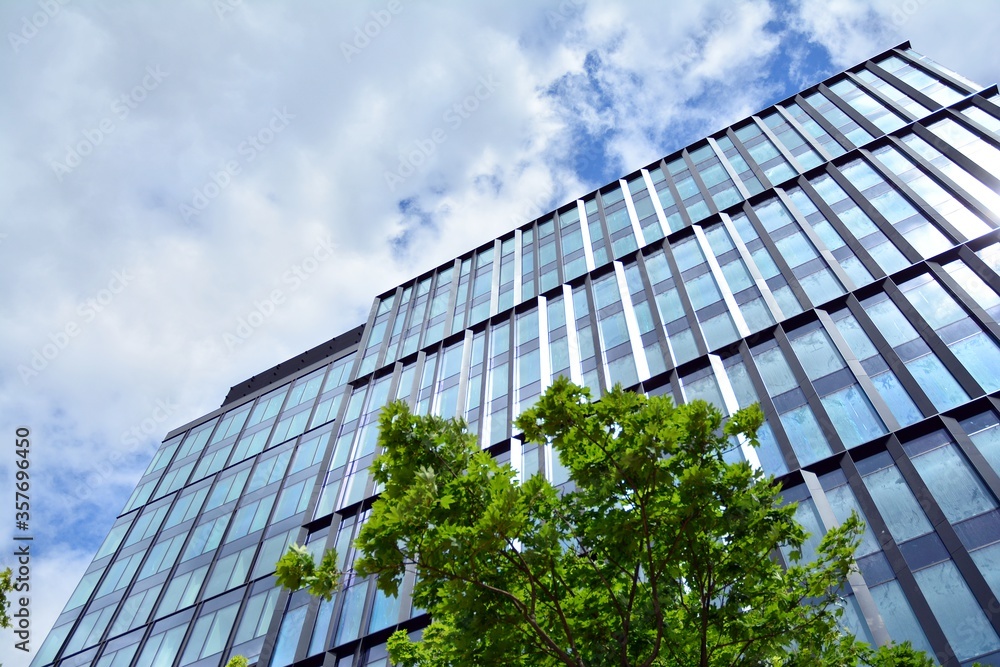 Facade texture of a glass mirrored office building. Fragment of the ...