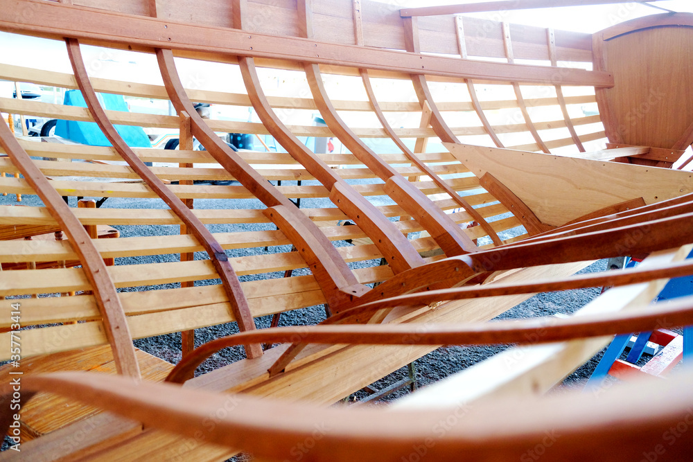 Small boatyard construction of a wooden boat. Ribs, keel, bulkheads and ...