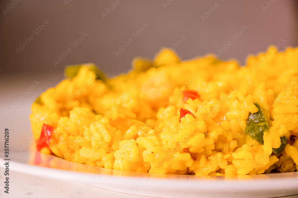 Typical Spanish food of rice with seafood, vegetables and saffron that ...