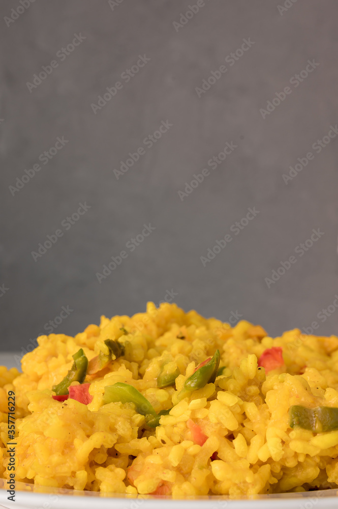 Typical Spanish food of rice with seafood, vegetables and saffron that ...