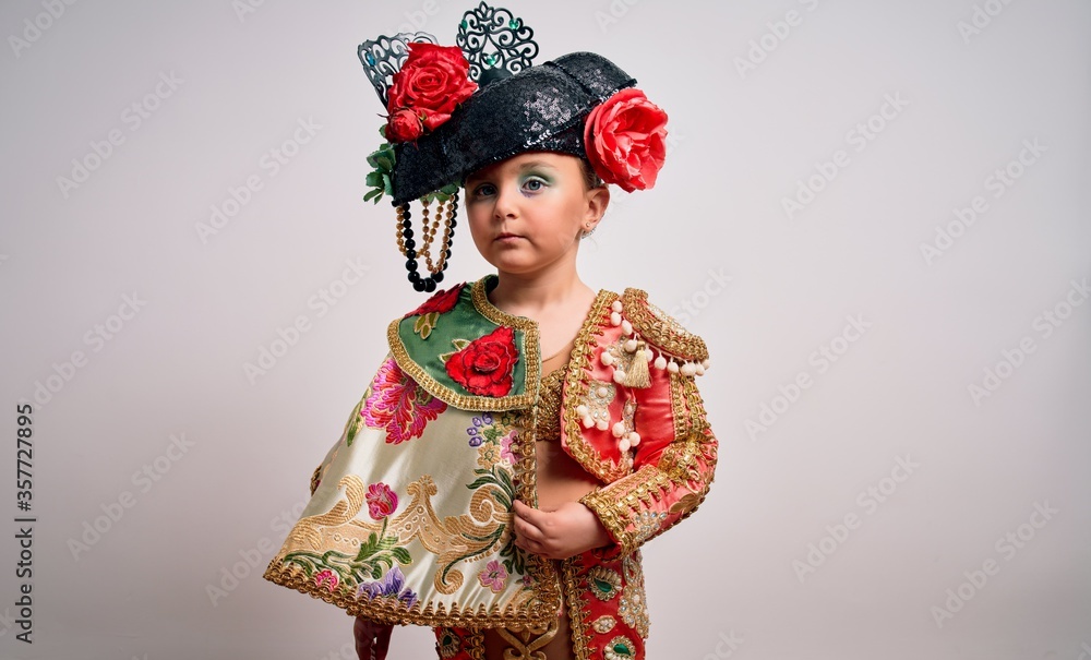 Young little caucasian kid girl wearing bullfighter traditional folkore ...