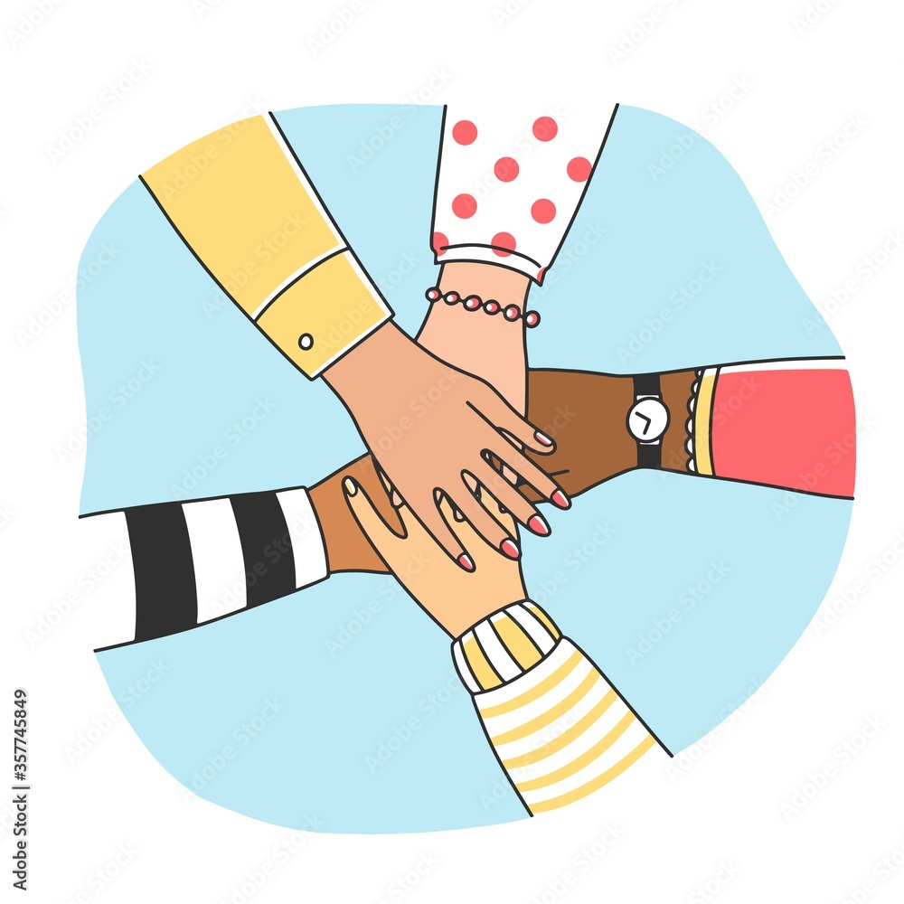 Diverse women putting their arms together, expressing unity and support ...