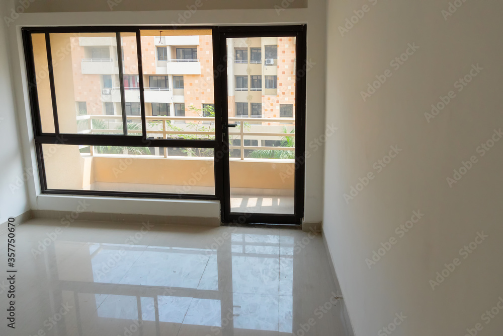 Inside view of window and room of new residential flats being built at ...