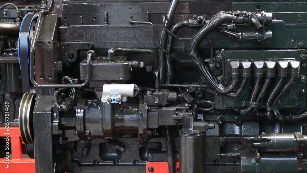 Details and components of machines. Fragment of the diesel engine ...