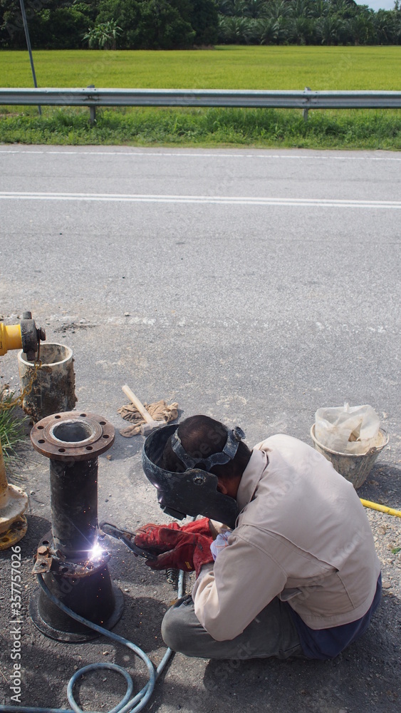 Ipoh, Malaysia. 1st Feb 2021: A male welder is carrying out welding ...