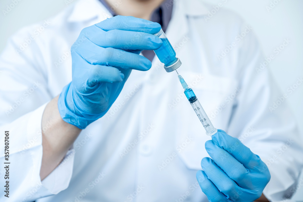 Professional doctors perform testing and analyzing samples of vaccines ...