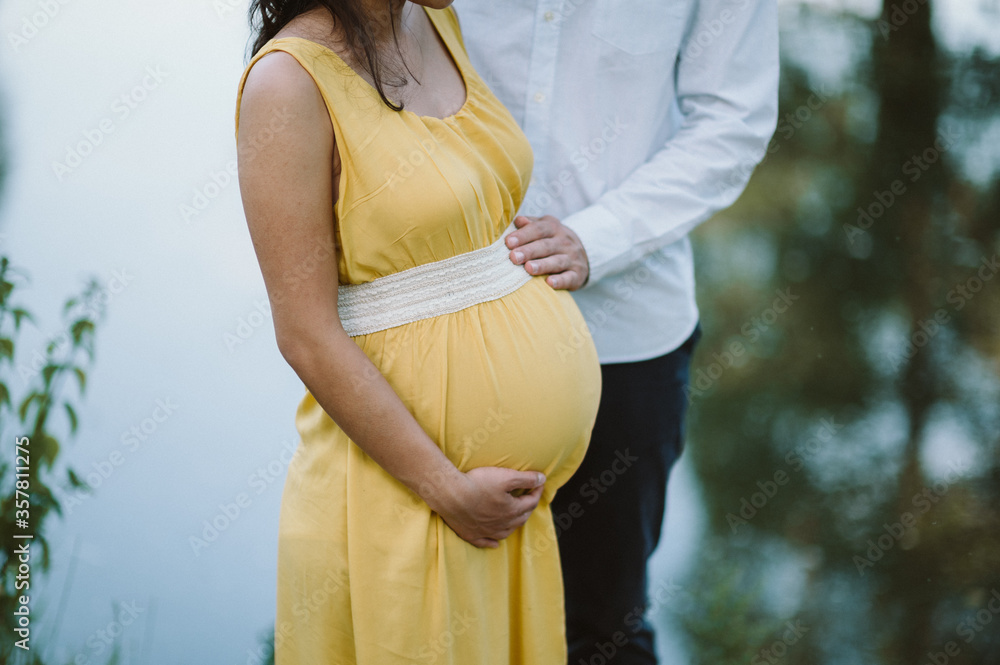Young pregnant couple expecting a child - Happy Family Moments in ...