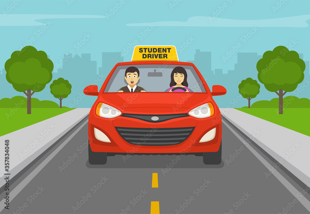 Terrified instructor sitting in car next to a female student driver ...