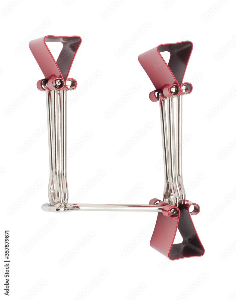 Cyrillic letter Tse red binder clips alphabet. Office metal foldback ...