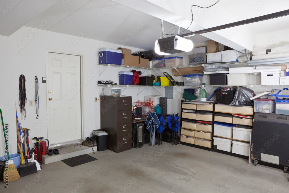 Typical suburban garage full of boxes and storage items. Stock Photo ...