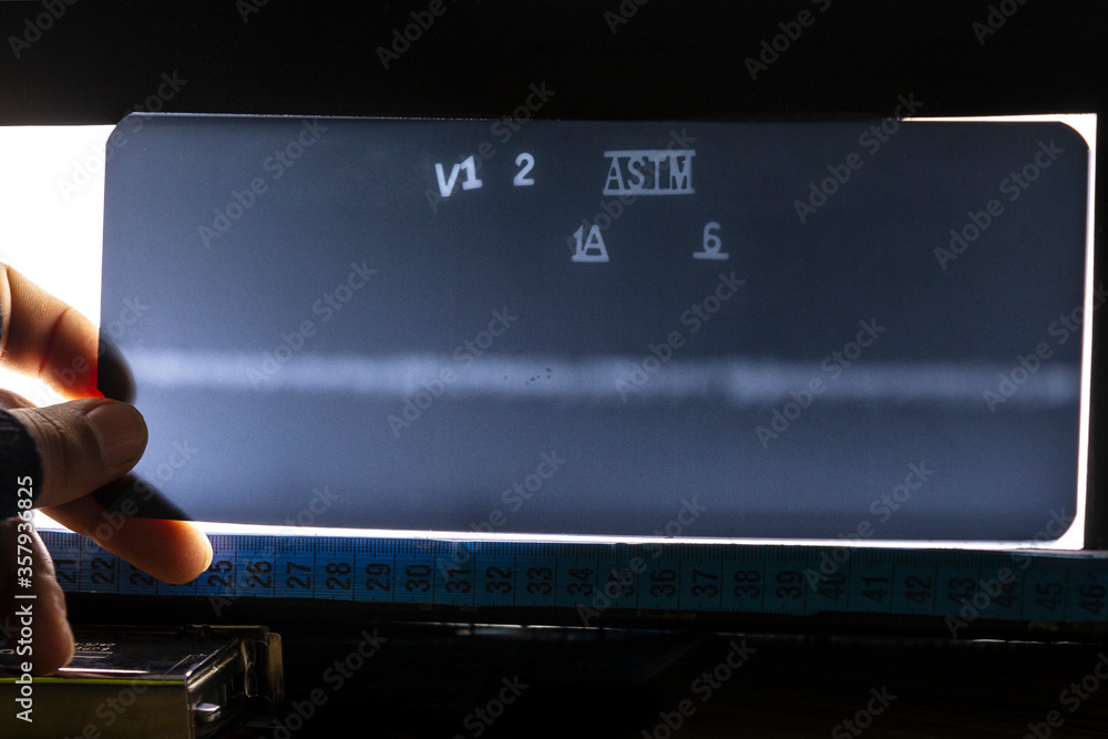 Inspector evaluation radiographs of the welds with viewer. The weld ...