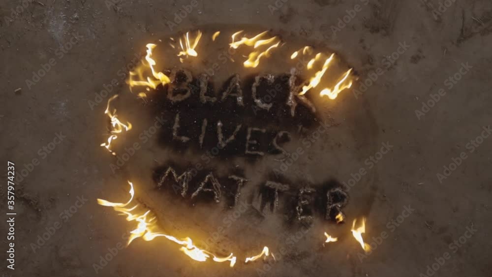 Video Stock Black Lives Matter text slogan fire flames, human rights ...