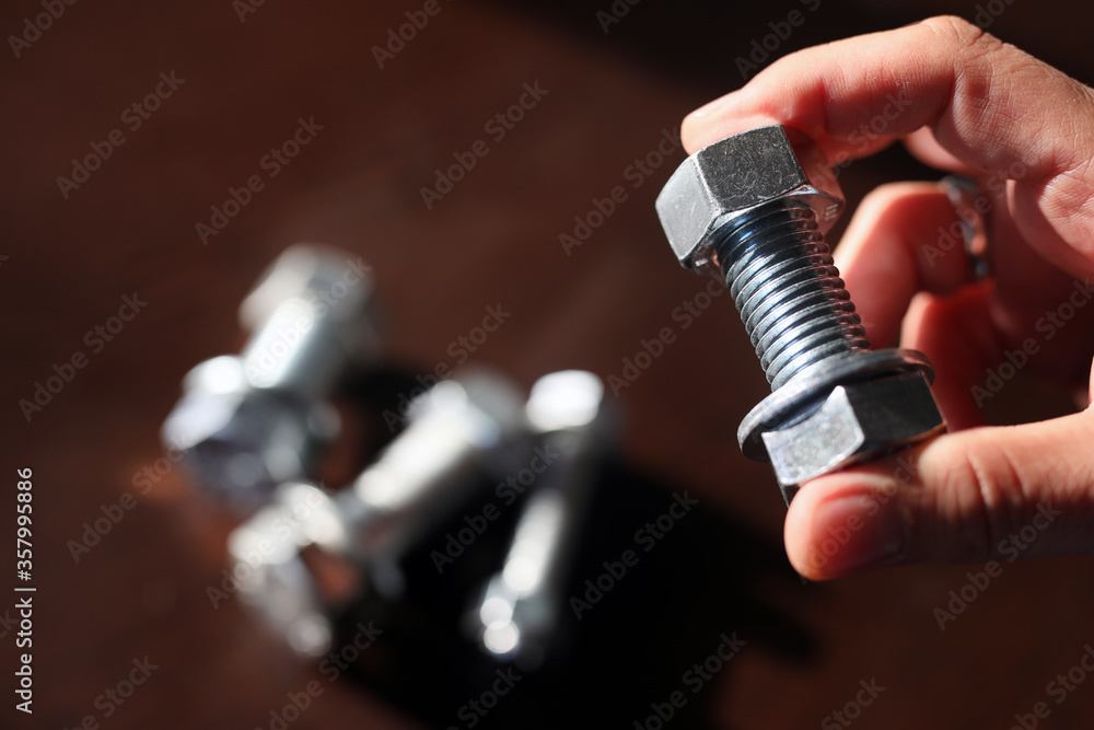 View of the bolt, nuts and washer. A fastener (US English) or fastening ...