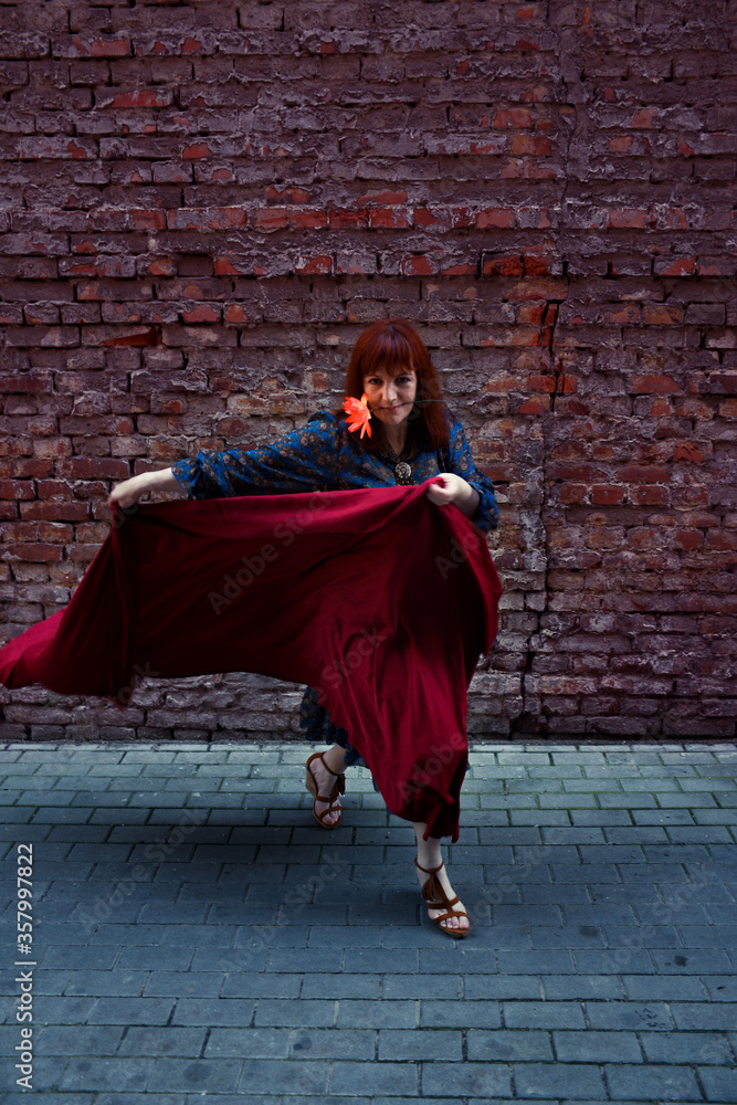 Motion blurred portrait of attractive beautiful middle aged woman with ...