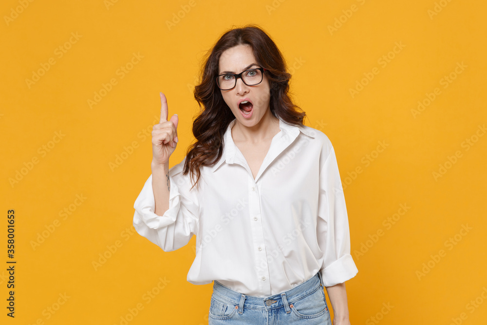 Angry strict young brunette business woman in white shirt glasses ...