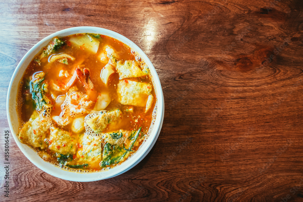 Acacia omelets and fresh shrimp in vegetable sour soup at restaurant ...