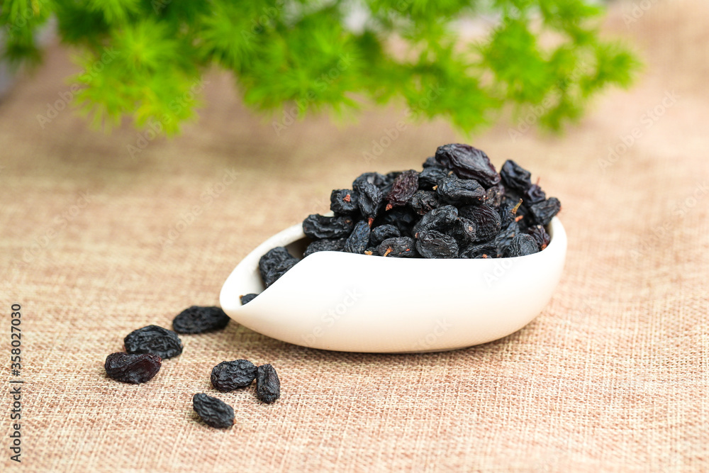 black raisin Stock Photo | Adobe Stock