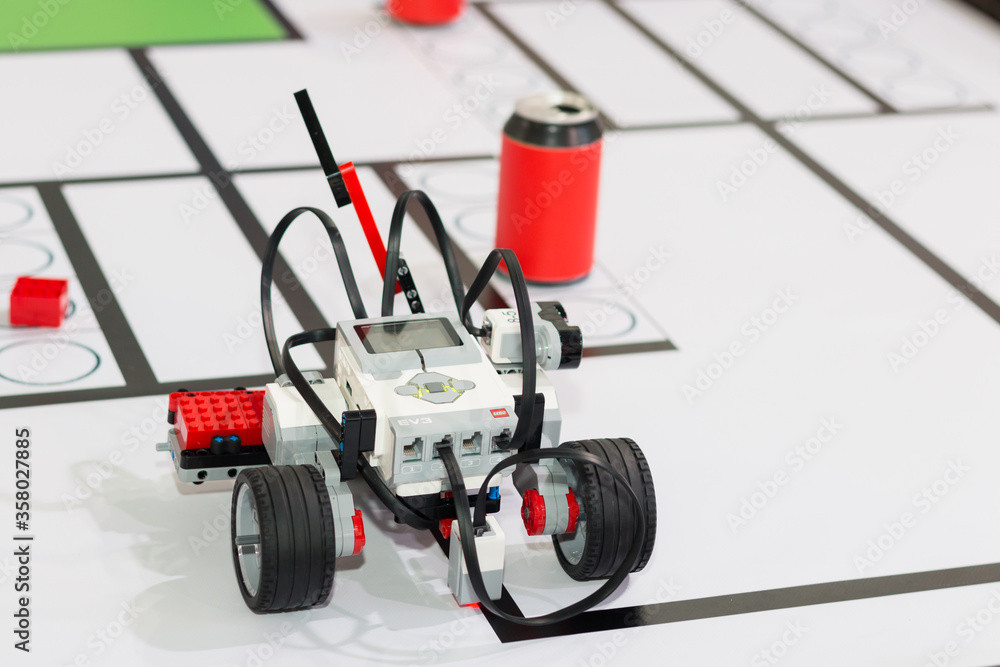 Minsk, Belarus. March, 2018. Boys construct and code robots. Lego ...