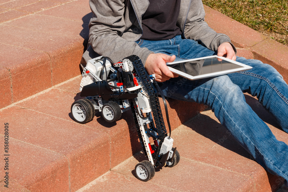 Minsk, Belarus. March, 2018. Boys construct and code robots. Lego ...