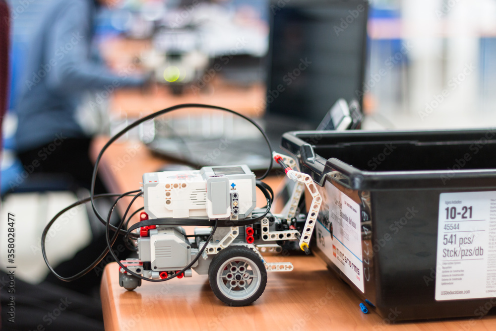 Minsk, Belarus. March, 2018. Boys construct and code robots. Lego ...