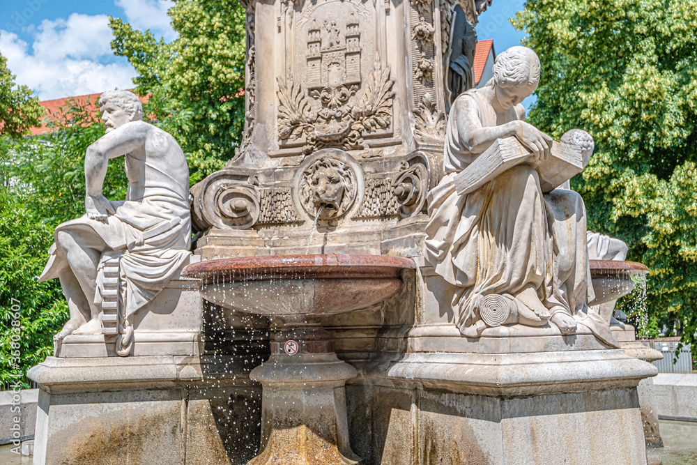 Old Hasselbach fountain and obelisk, pedestal with figures representing ...