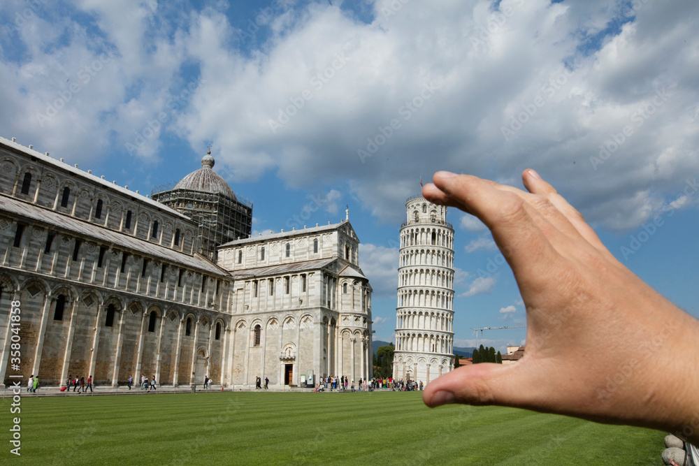 A silly fun false perspective view of the photographer’s hand holding ...
