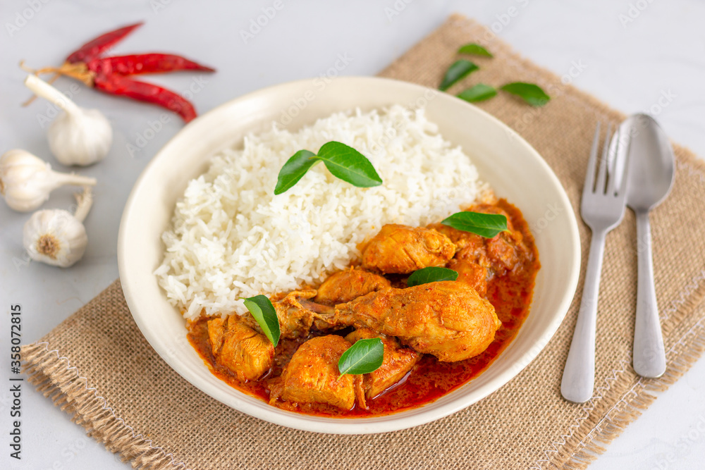 Spicy South Indian Chicken Curry and Rice with Fresh Curry Leaves ...
