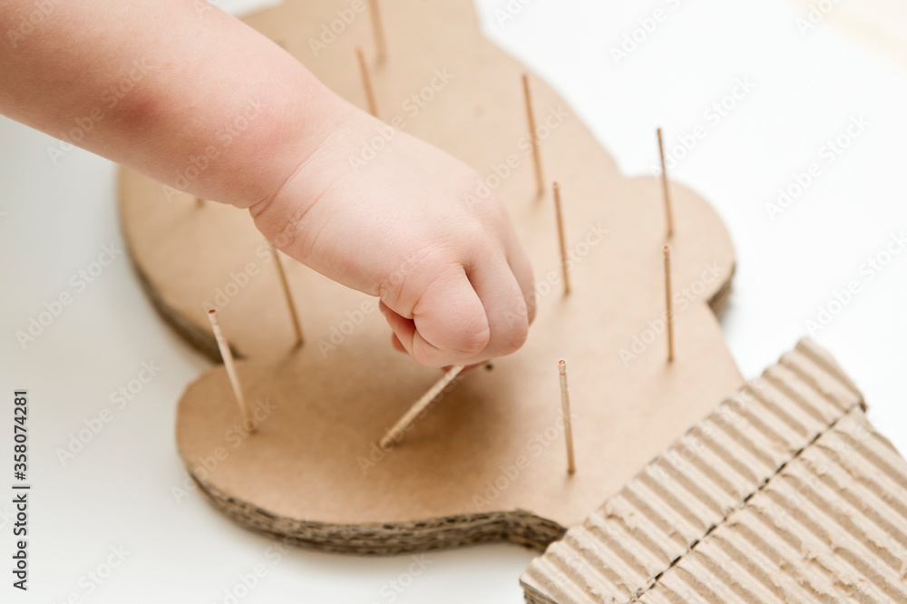 DIY toys. Corrugated cardboard cactus with wooden toothpick spikes ...